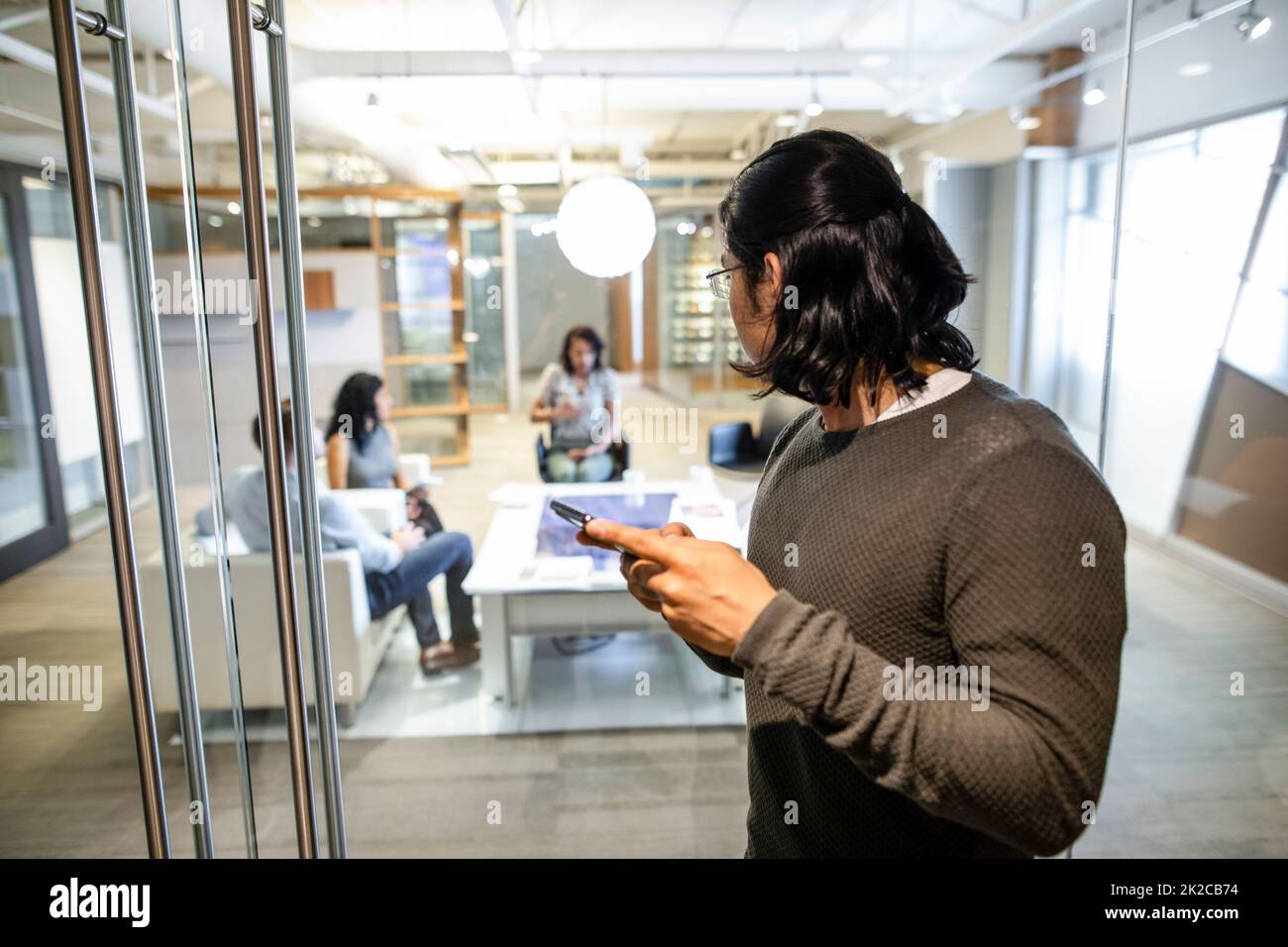 Man through glass hi-res stock photography and images - Alamy