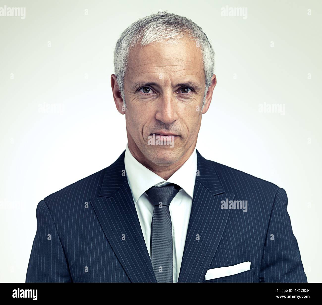 The man in charge. A cropped portrait of a serious mature man wearing a ...