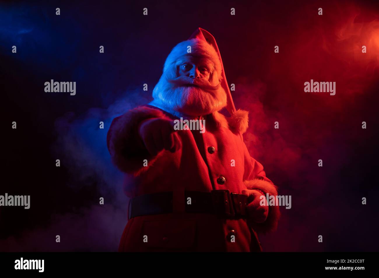 Santa Claus portrait in blue red neon light and smoke Stock Photo - Alamy