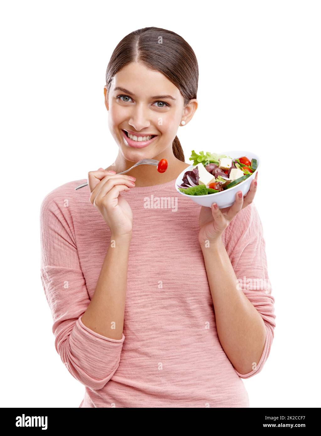 Woman eating food on fork hi-res stock photography and images - Alamy