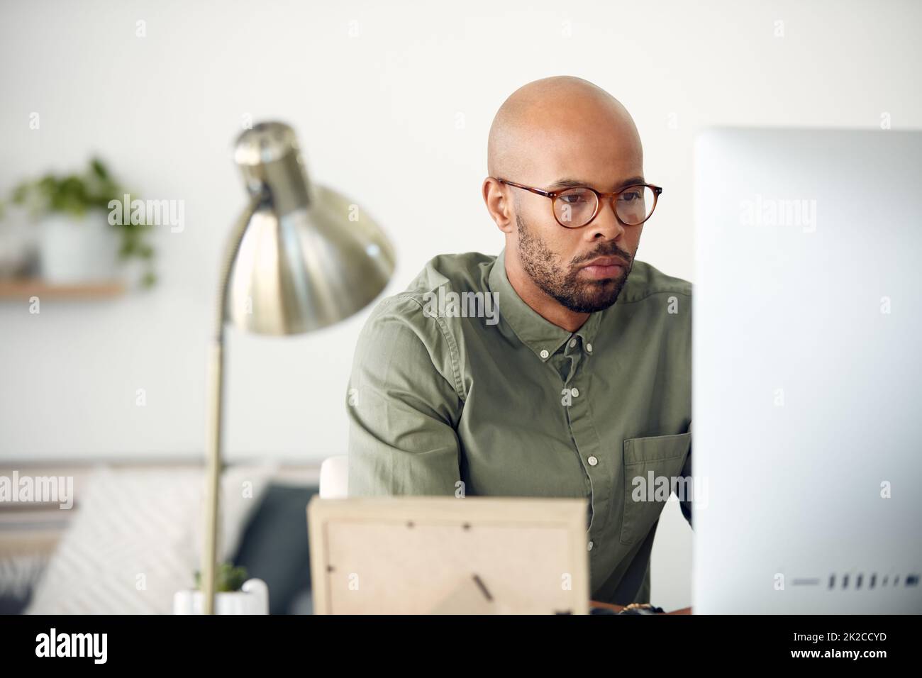 Person working on computer behind hi-res stock photography and images ...