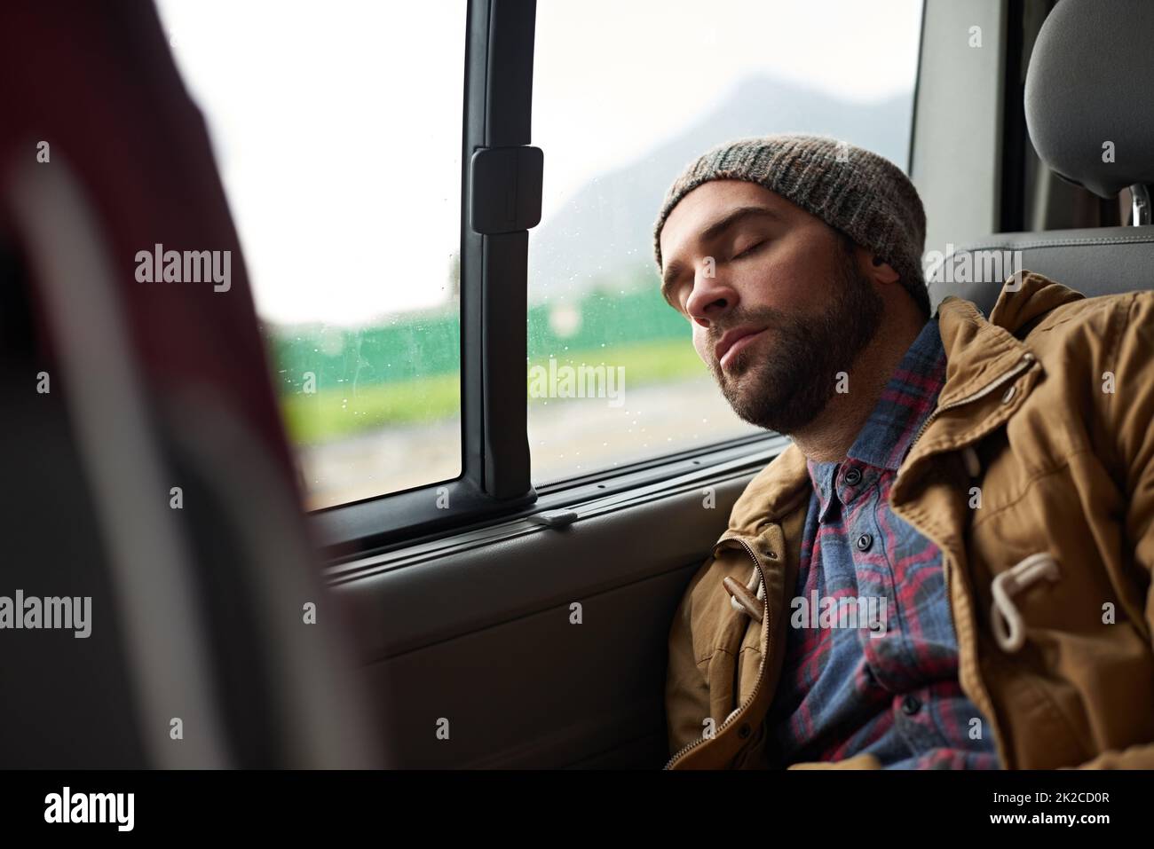 Handsome young man sleeping in car hi-res stock photography and images ...