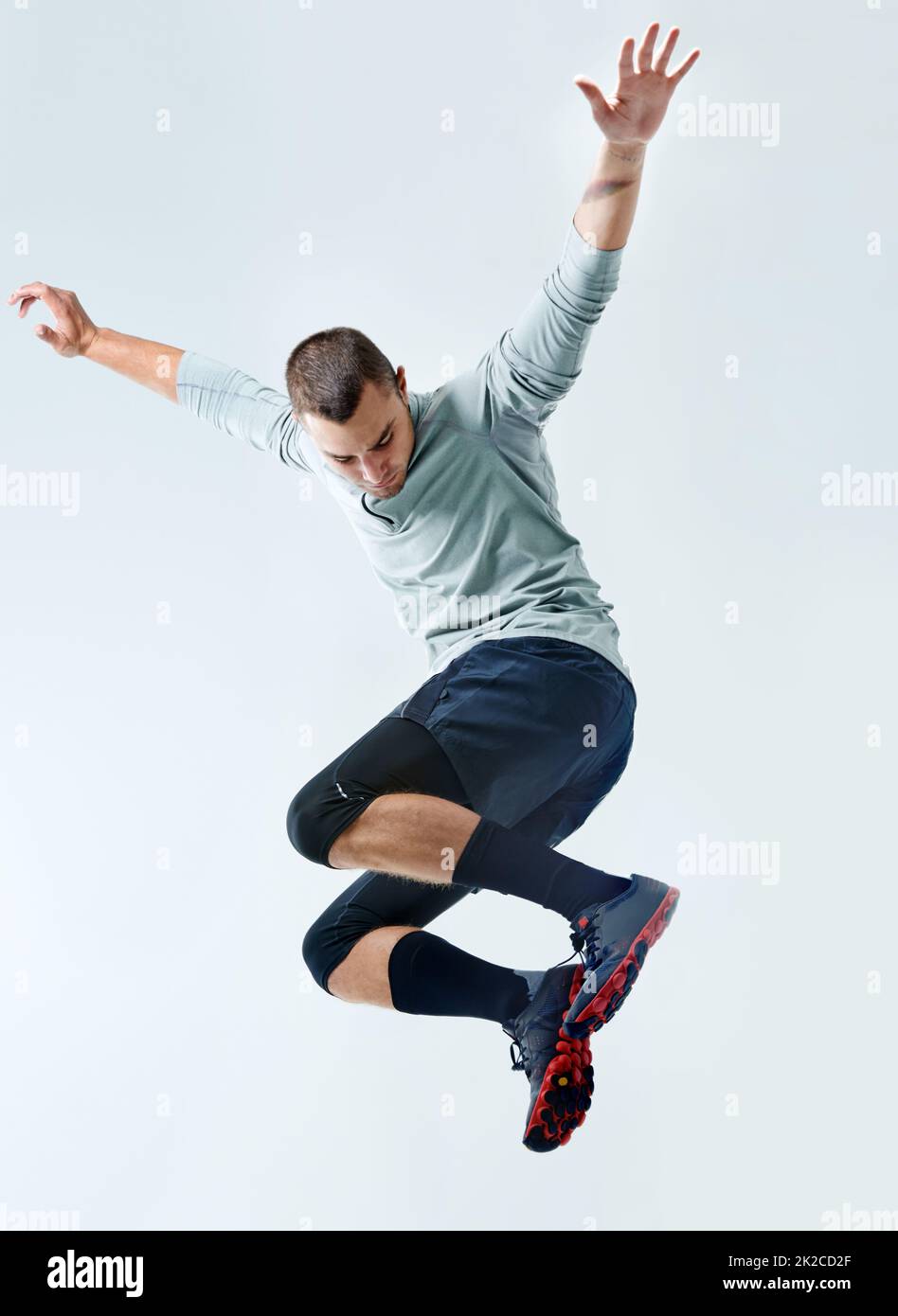 Jumping action serious hi-res stock photography and images - Alamy