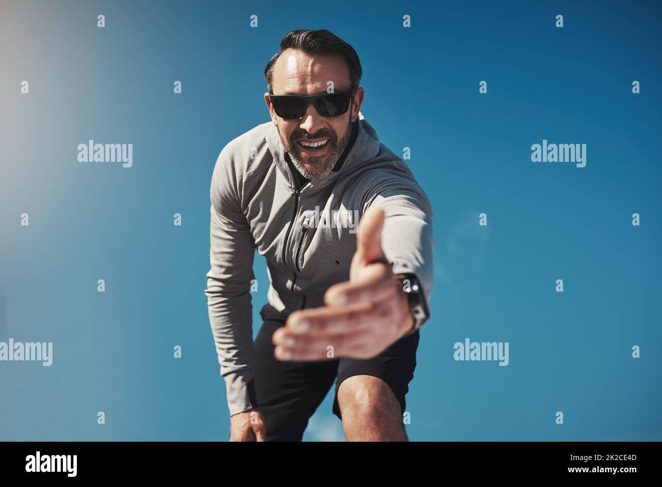 Hand reaching to sky hi-res stock photography and images - Alamy