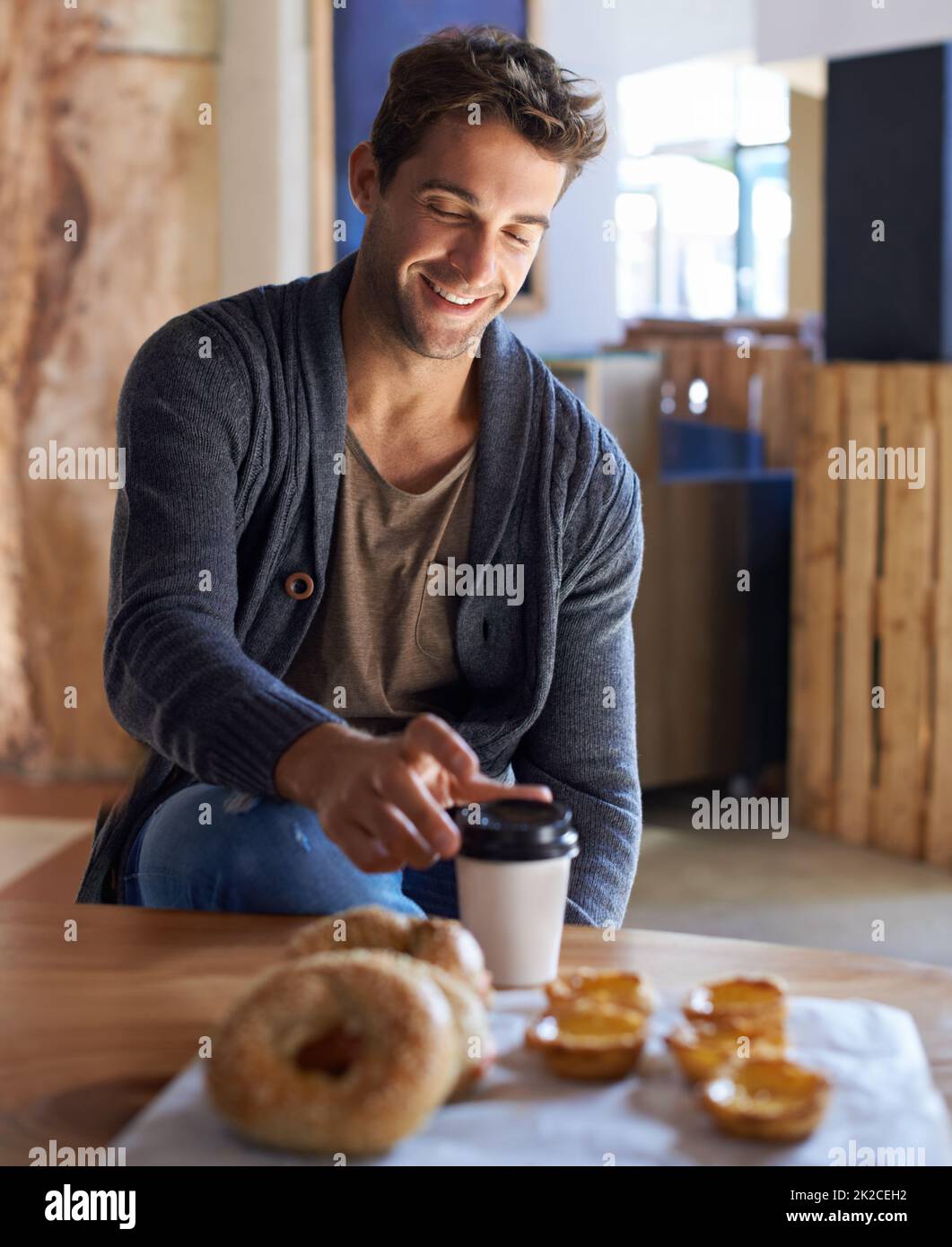 Reaching for coffee cup hi-res stock photography and images - Alamy