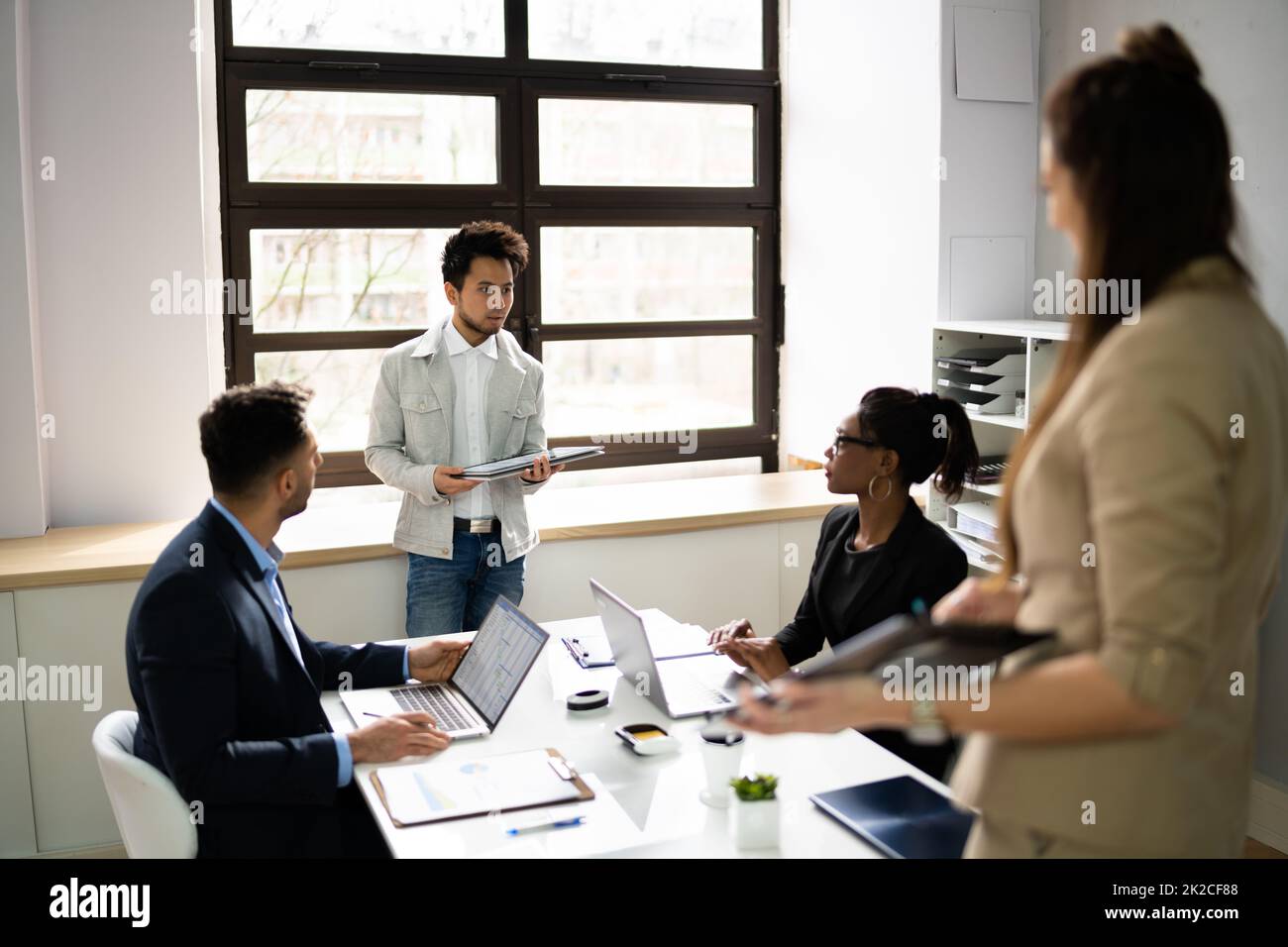 Diverse Business People Group At Workplace Stock Photo - Alamy