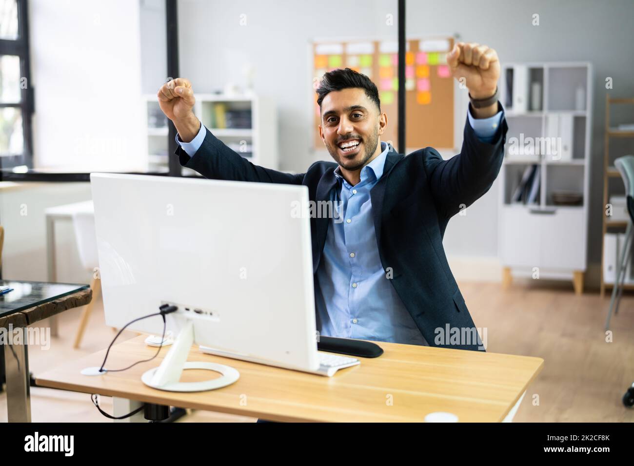Smiling Business Man Working On Business Computer Stock Photo - Alamy