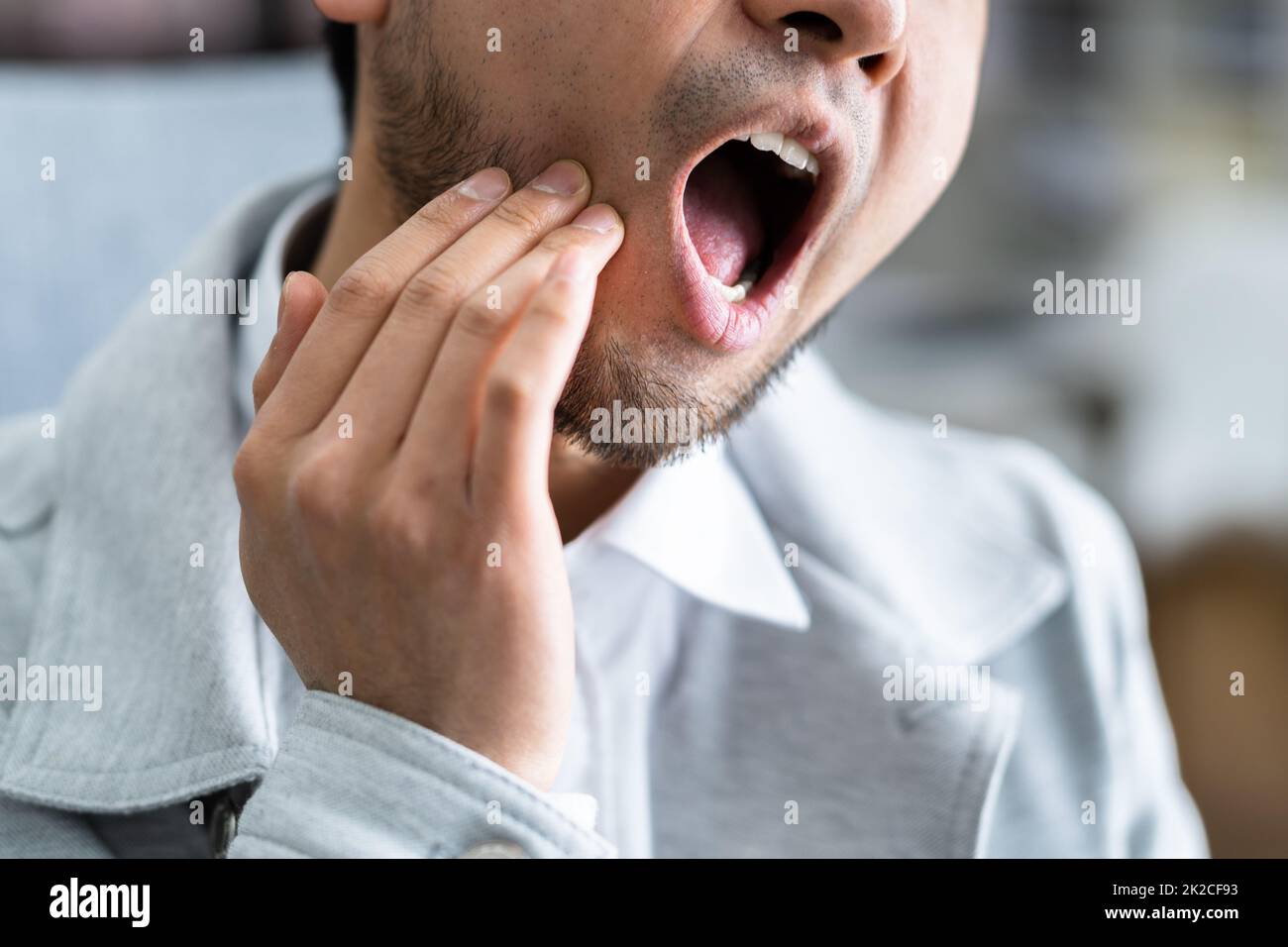 Sore Tooth And Decay. Man Dental Health Stock Photo - Alamy