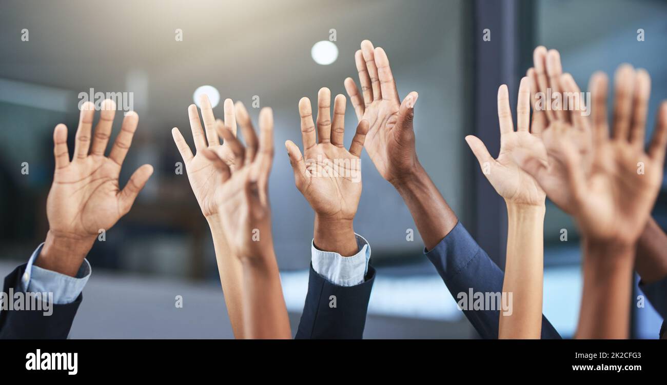 African american person raising hands hi-res stock photography and ...