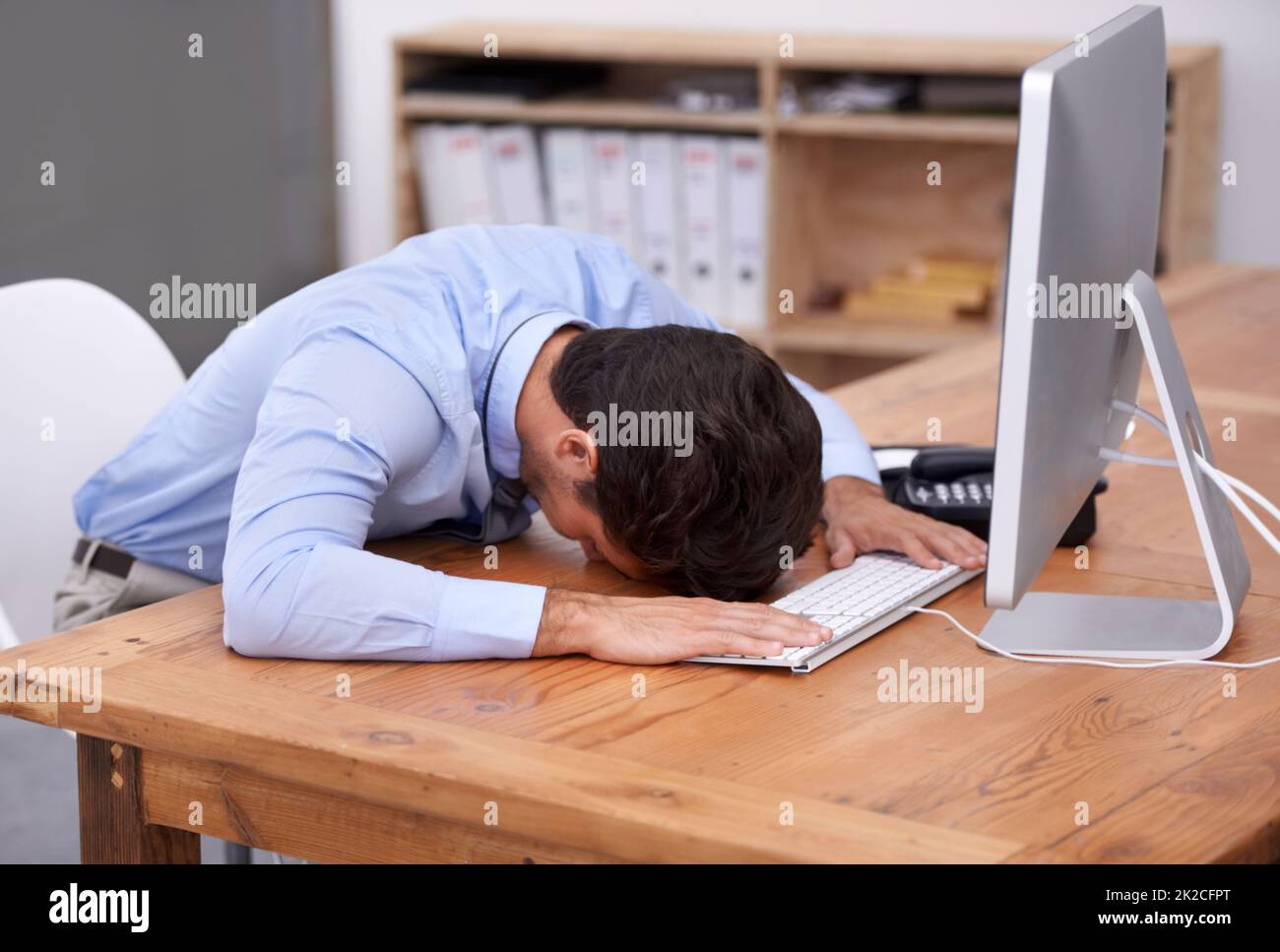 Head on desk hi-res stock photography and images - Alamy