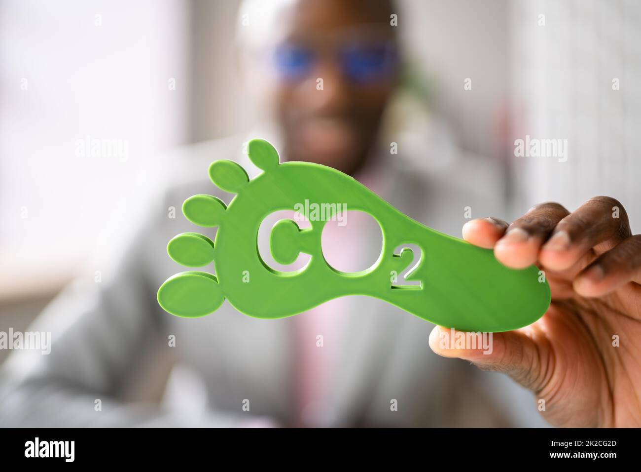 Carbon Dioxide Footprint Sign. Co2 Reduction Stock Photo - Alamy