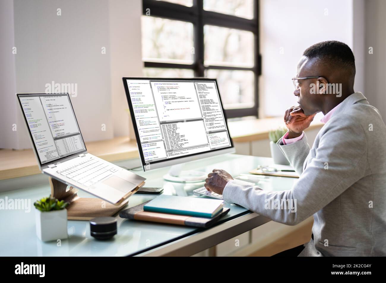 African American Man Programmer. Girl Coding Stock Photo - Alamy African American Man Programmer. Girl Coding Stock Photo - Alamy