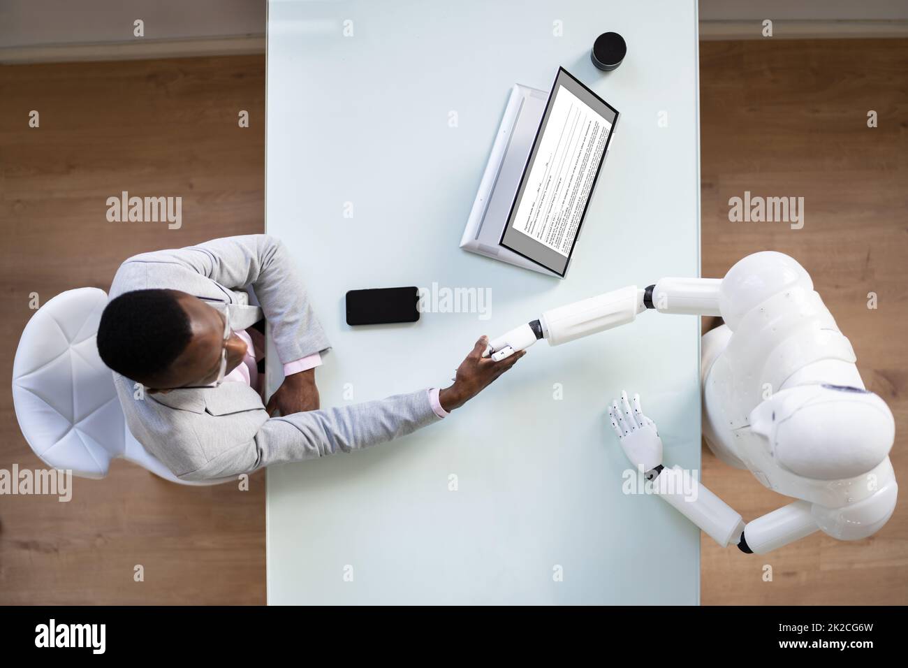 Artificial Intelligence Robot Recruiting African Man Stock Photo - Alamy