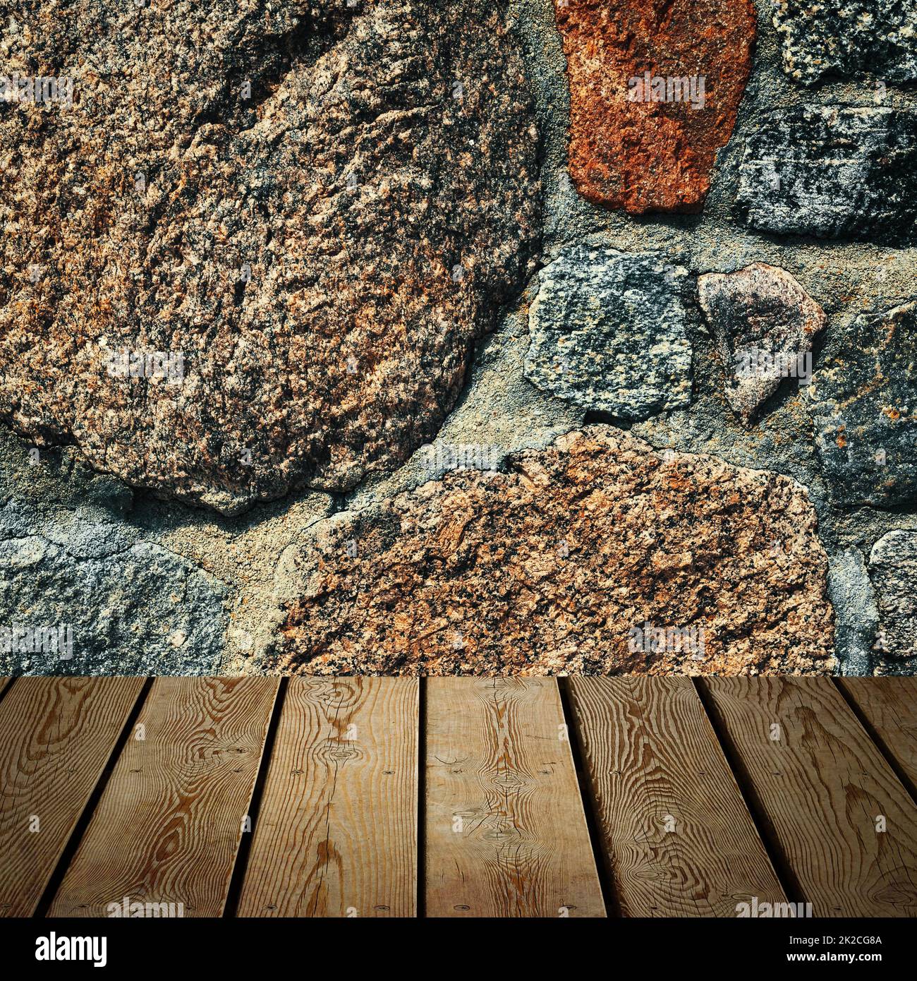 The background is blank wooden boards and a textured stone wall with ...