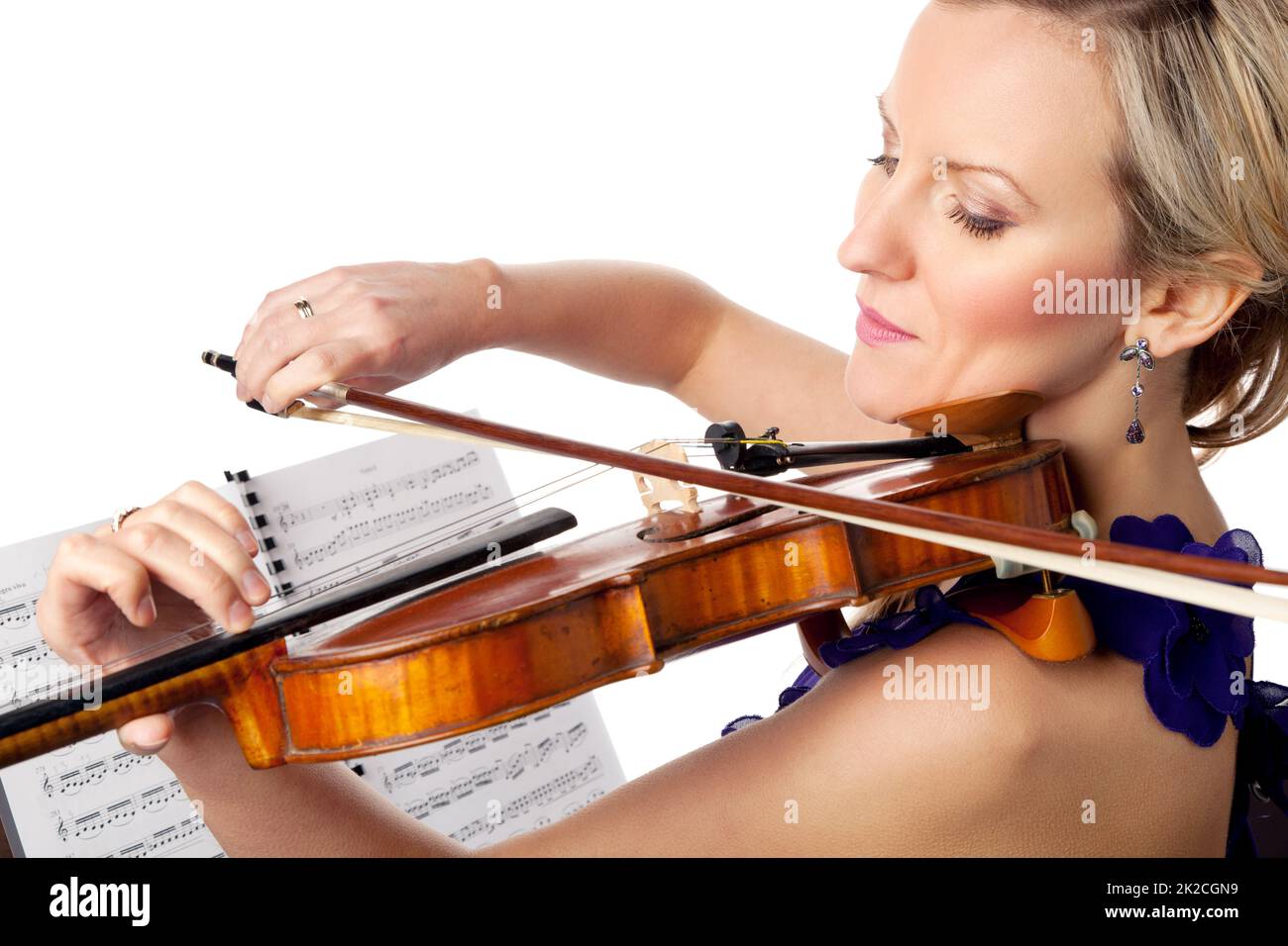 Beautiful woman playing violin hi-res stock photography and images - Alamy
