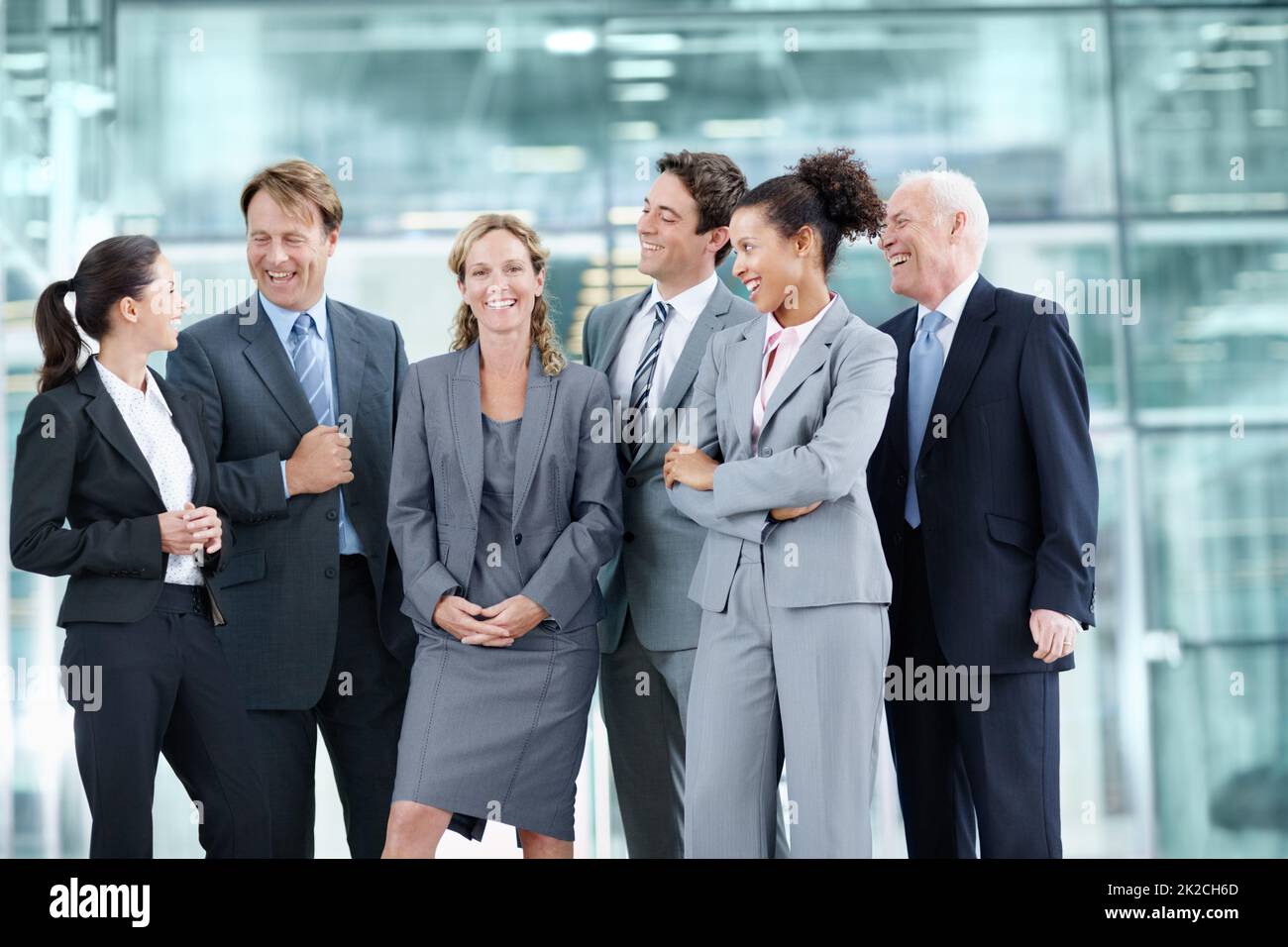 Supported by her proud team of coworkers. Positive group of ...