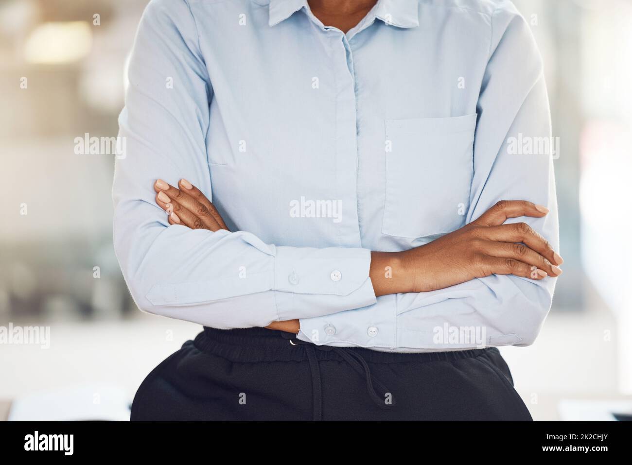 Motivation, vision and business woman with arms crossed in an office ...