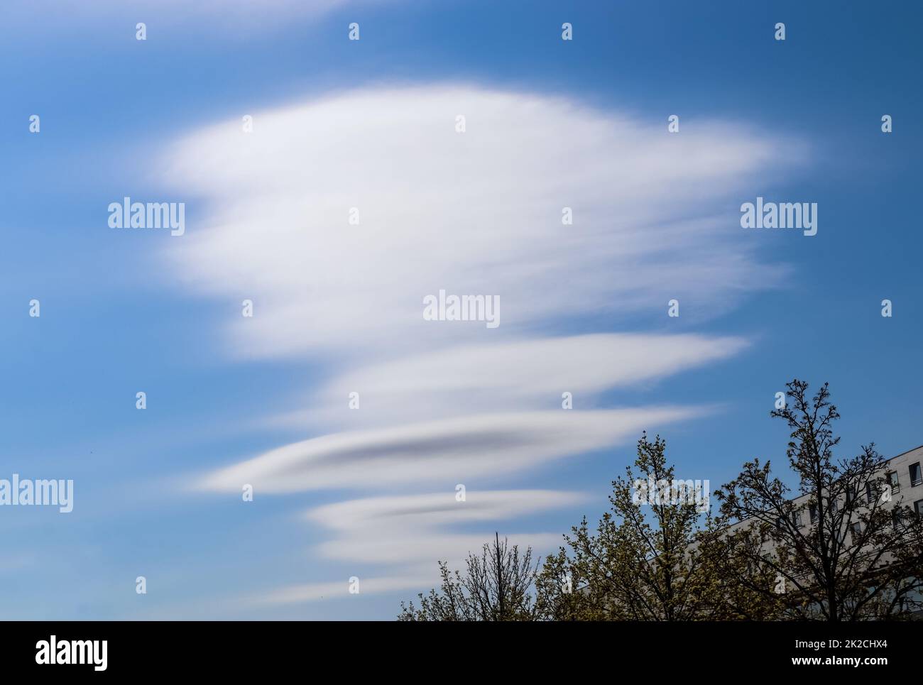 Stunning cirrus cloud formation panorama in a deep blue sky Stock Photo ...