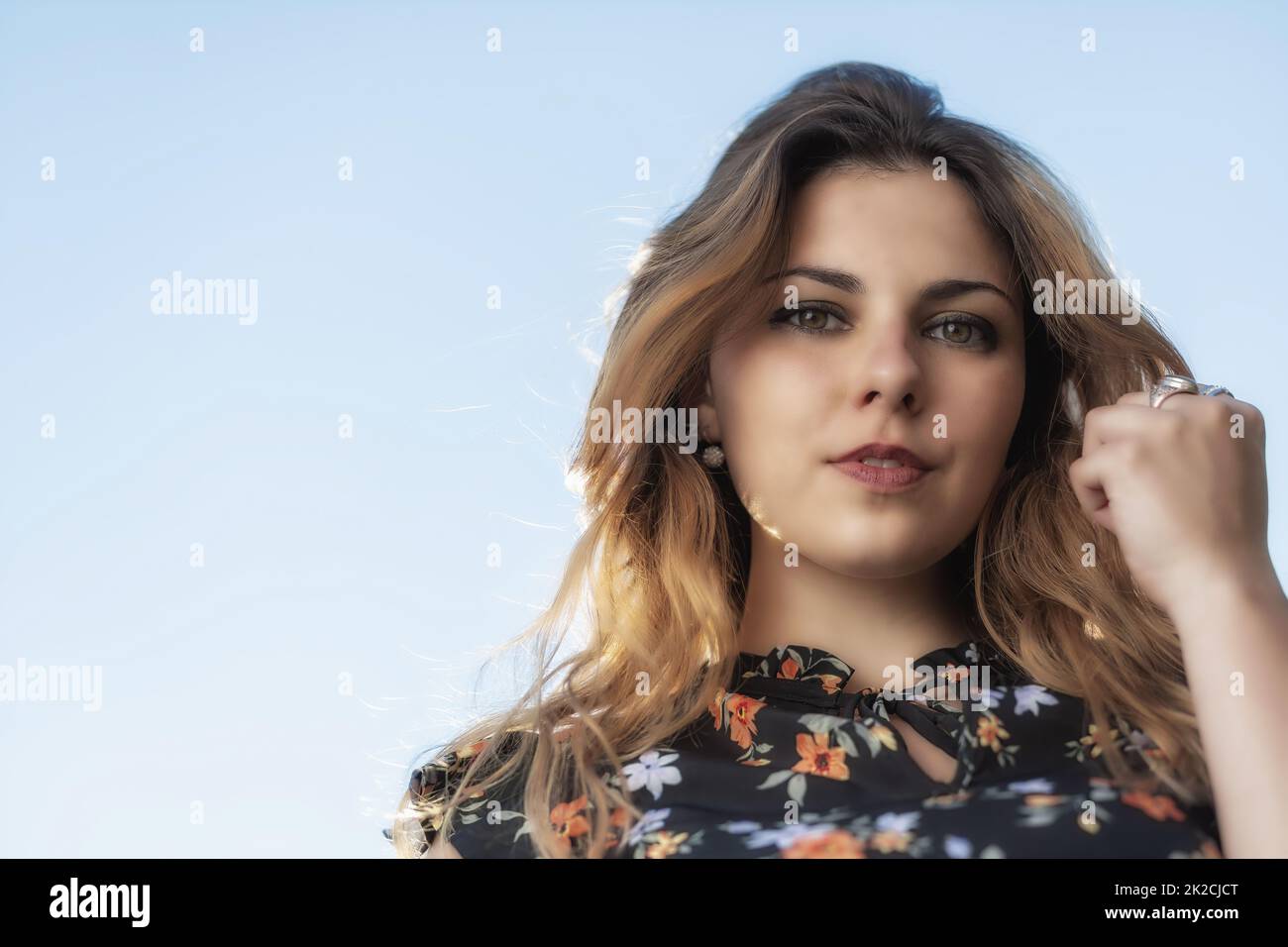 Cool atractive young woman is posing outdoors Stock Photo - Alamy