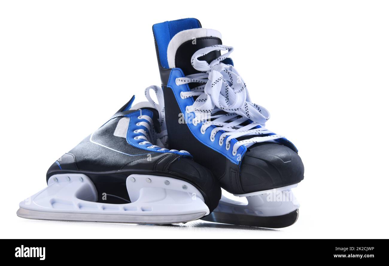 A pair of ice hockey skates isolated on white Stock Photo - Alamy