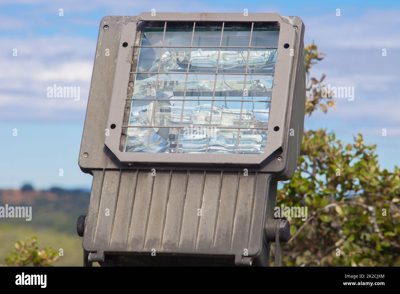 Big spotlight for public building on nature. Halide lamps with mercury ...