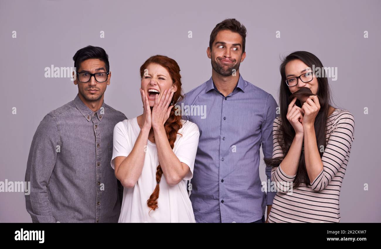 Lets put some humor into it. Studio shot of a group of diverse young ...