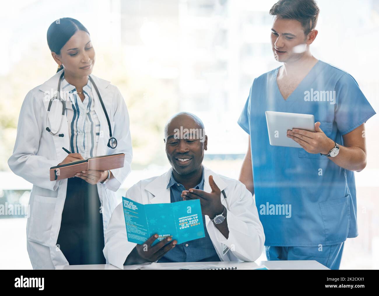 Diversity doctors, team and healthcare planning, collaboration and teamwork in meeting in ...