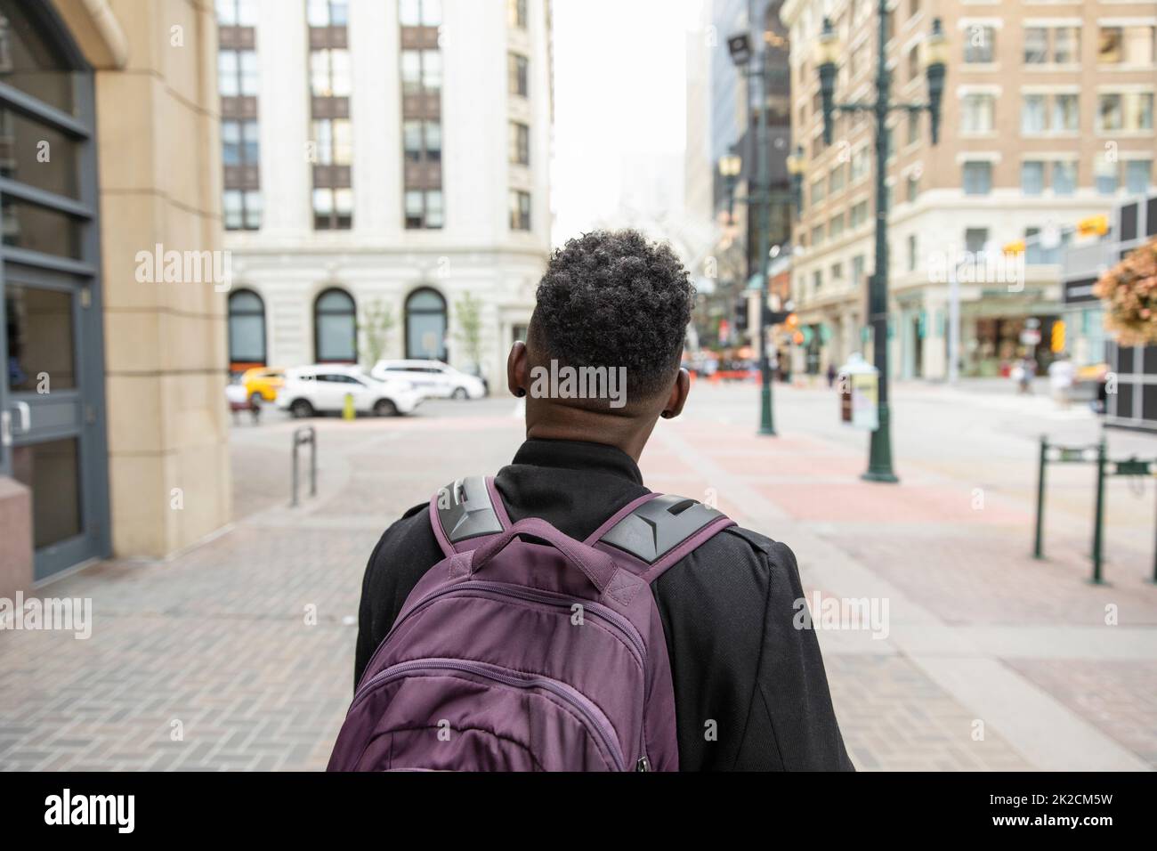 Man walking backpack hi-res stock photography and images - Alamy