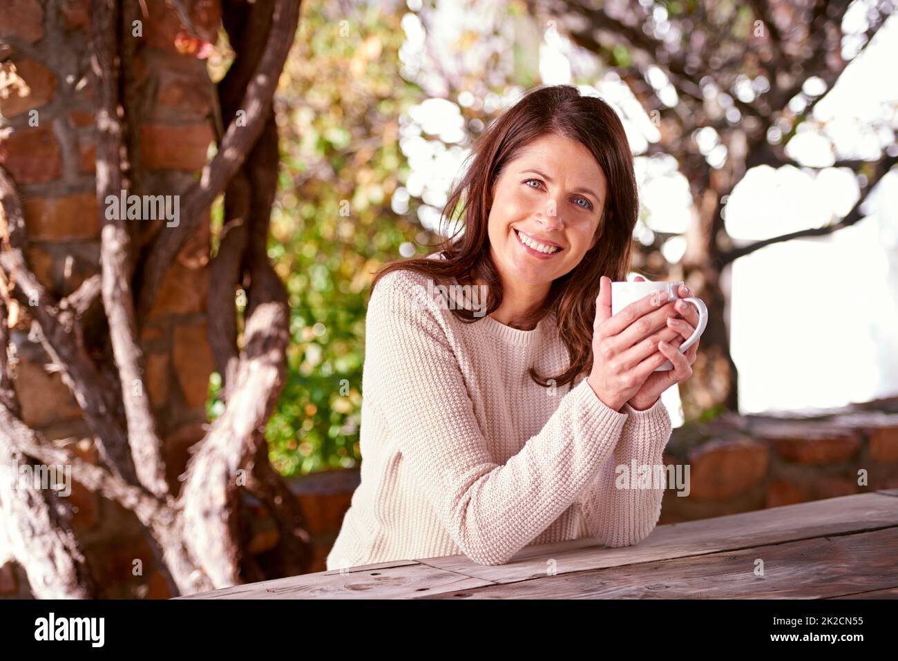 Feeling carefree over coffee. A portrait of a beautiful woman having ...