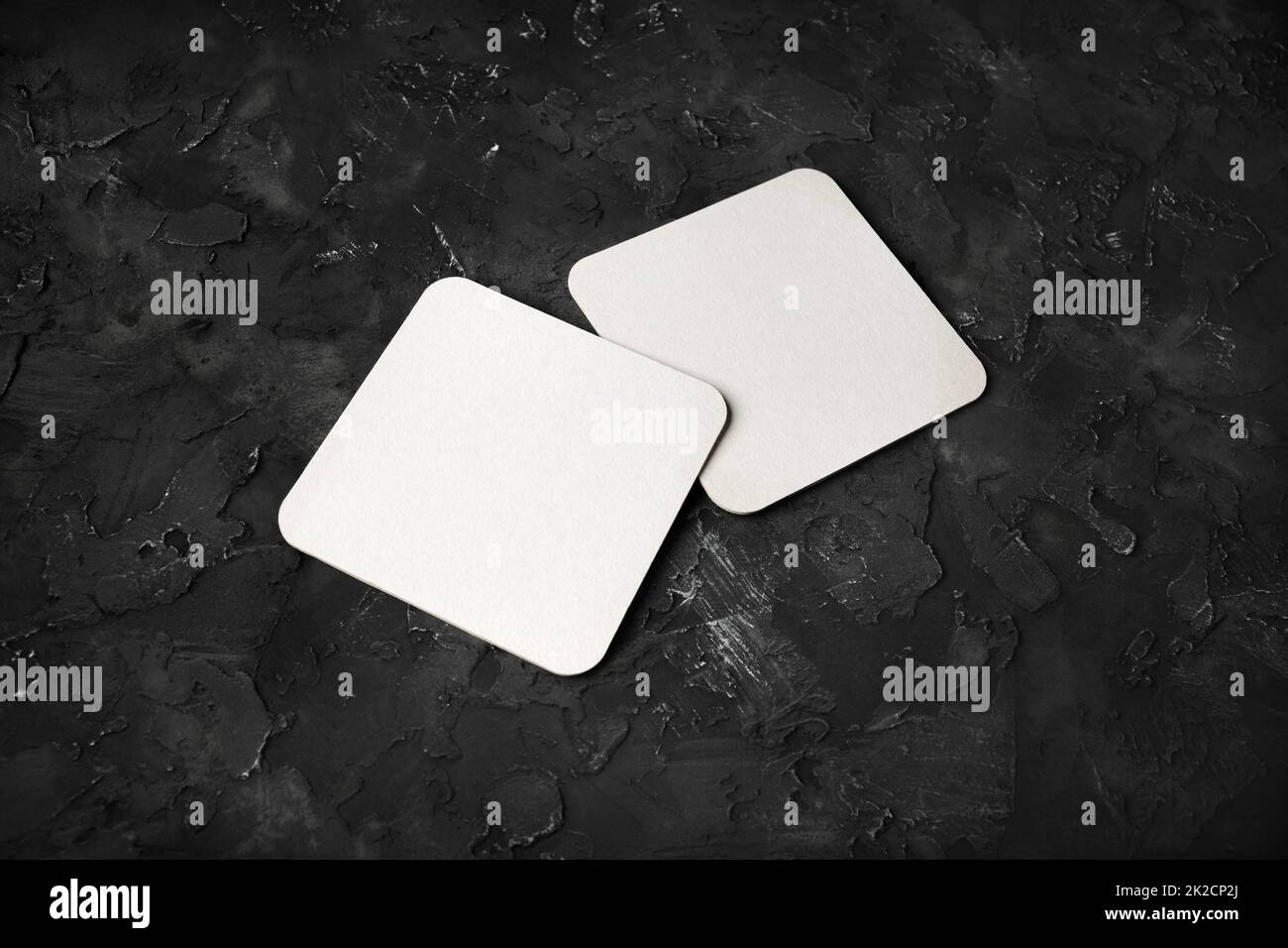 Square beer coasters Stock Photo - Alamy