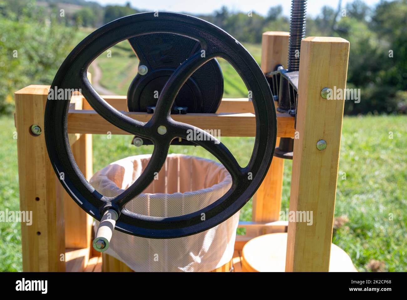 Closeup of an outdoor wooden apple cider press flywheel Stock Photo - Alamy