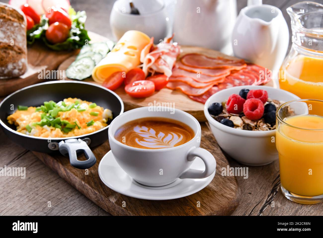 Breakfast served with coffee, scrambled eggs, cereals and ham Stock ...
