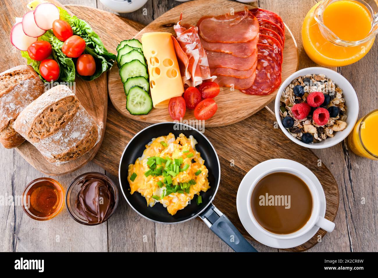 Breakfast served with coffee, scrambled eggs, cereals and ham Stock ...