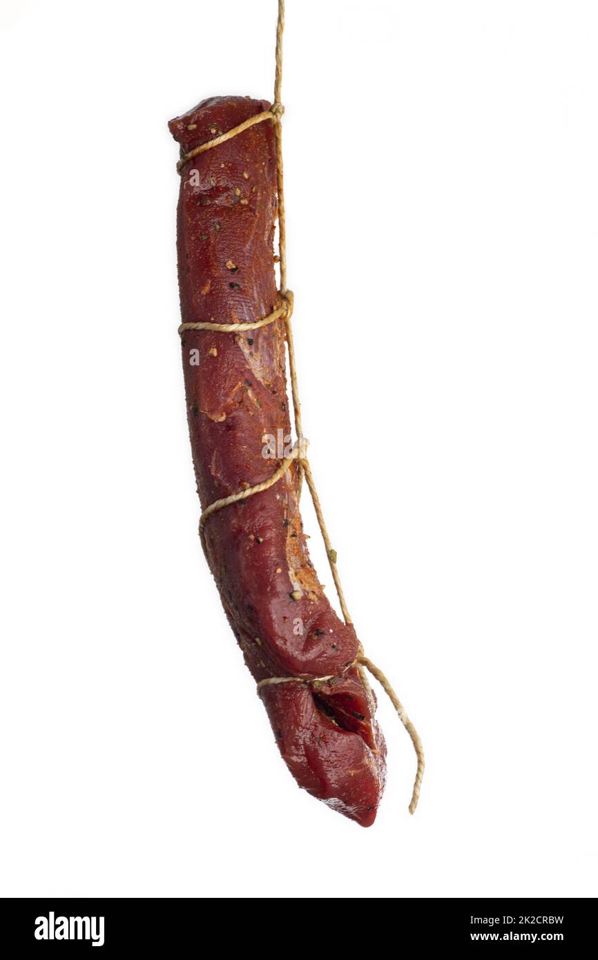 hanging raw pork fillet Stock Photo - Alamy
