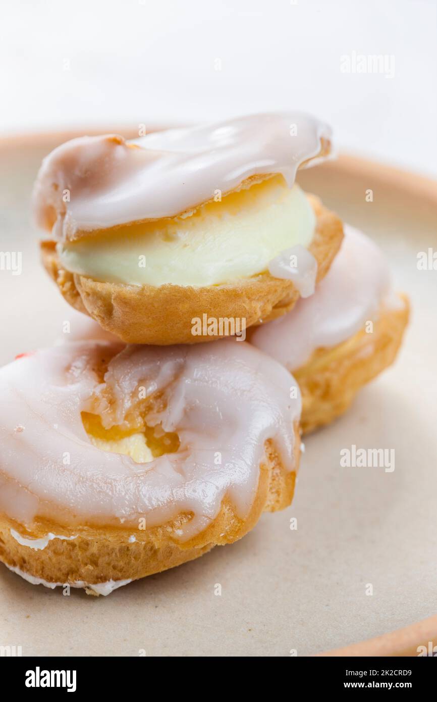 Three cream puffs hi-res stock photography and images - Alamy