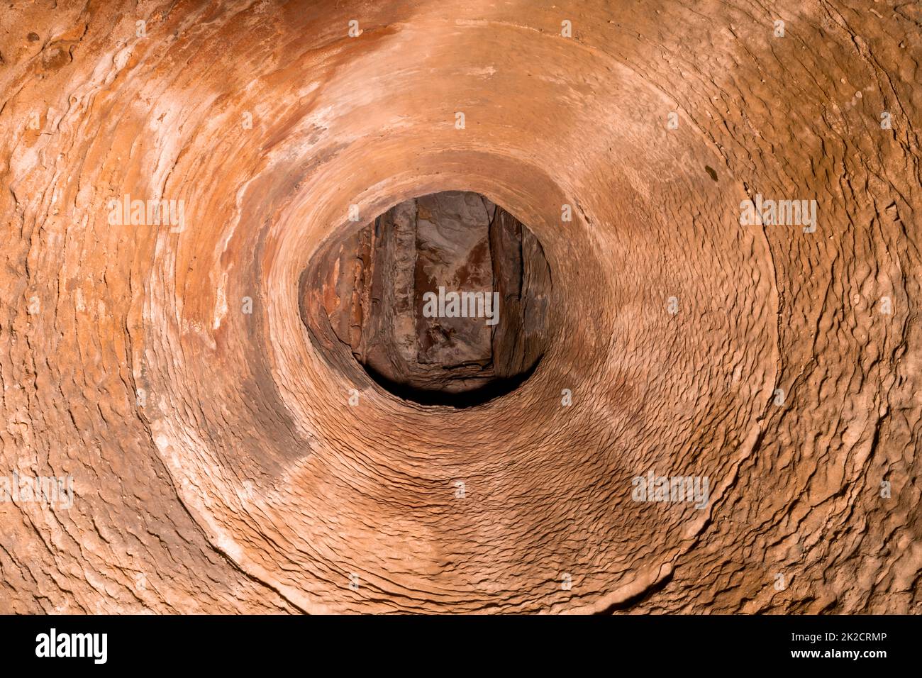 View upwards from a well shaft made of sandstone Stock Photo - Alamy