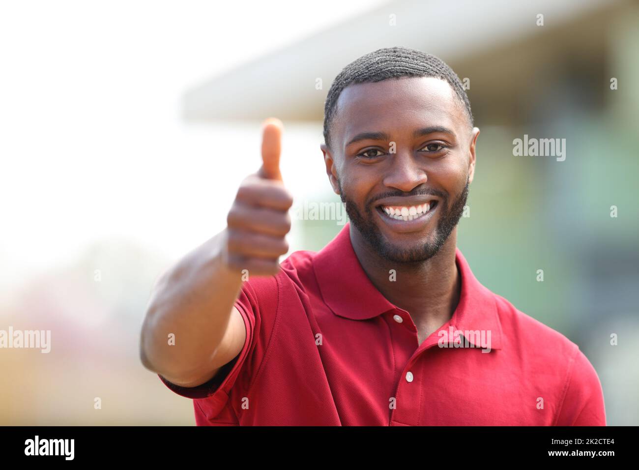 Happy black man thumbs up hi-res stock photography and images - Alamy