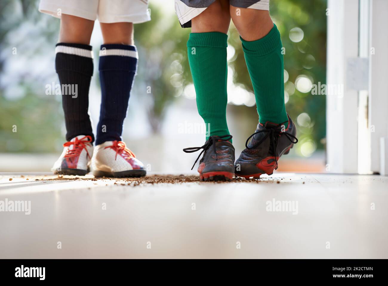 Oops Moms not going to be happy about that. Cropped shot of two boys in ...