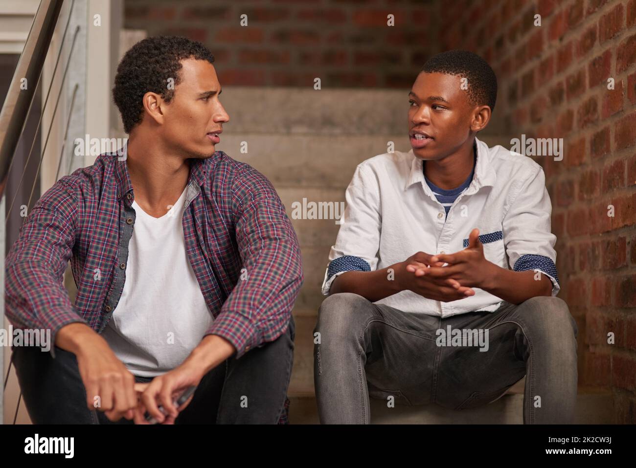 2 Young Men Talking