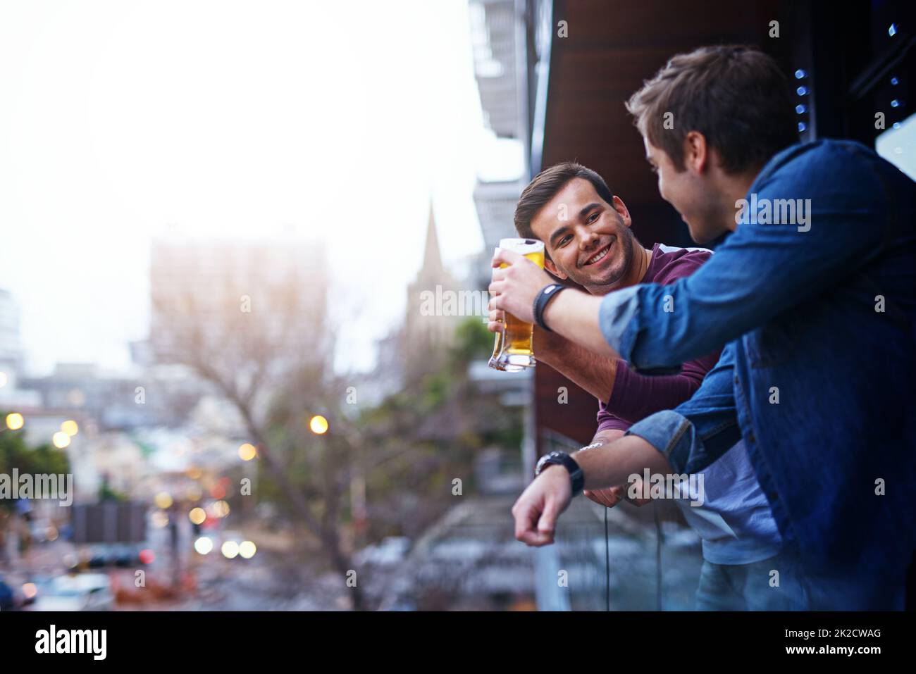 Two men drinking beer hi-res stock photography and images - Alamy
