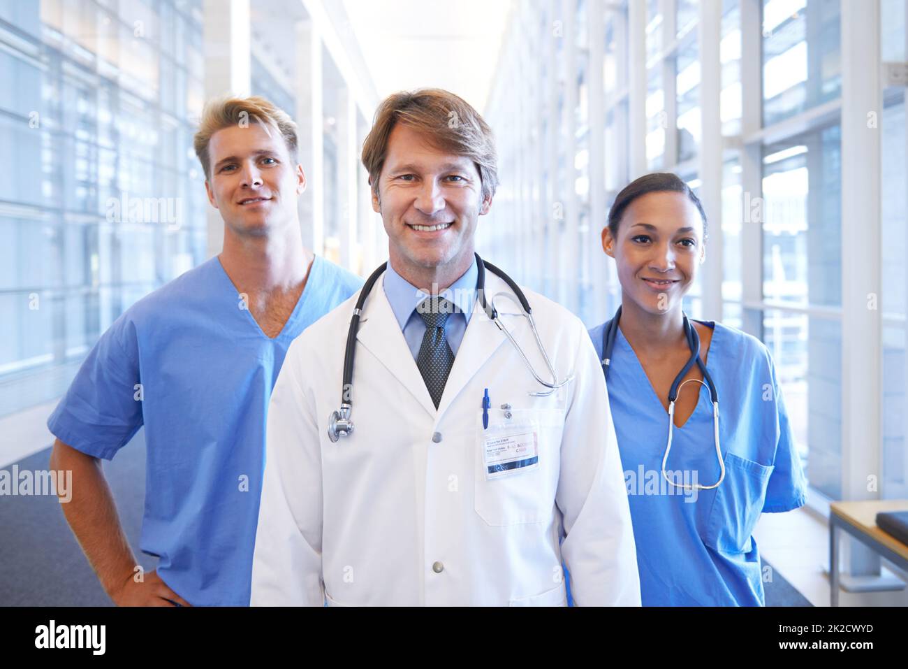 Man and a woman standing in a corridor hi-res stock photography and images - Alamy