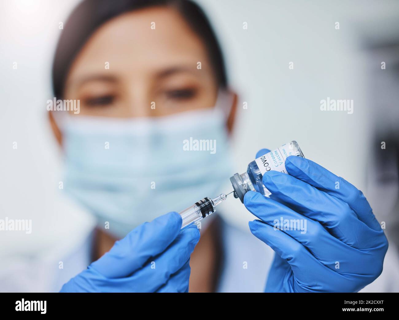 A cure to disease. Shot of a young female researcher working in a ...