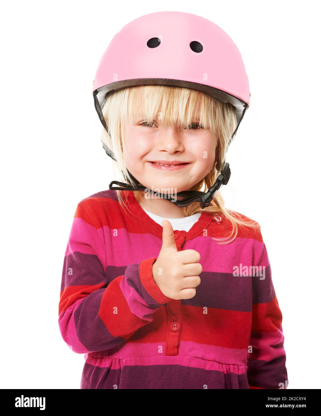 Safety first. Studio shot of a cute little blonde girl wearing a ...