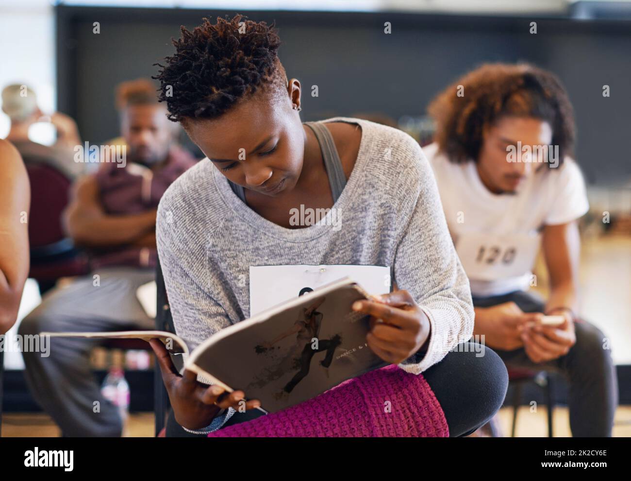 Reading a magazine sport hi-res stock photography and images - Alamy