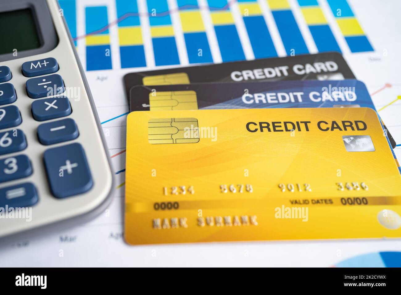 Credit card on chart and graph paper. Finance development, Banking ...
