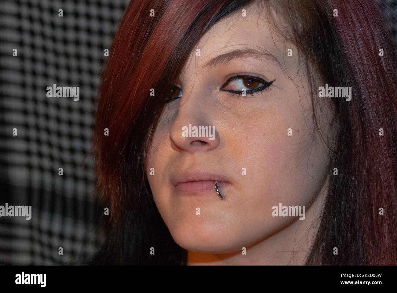 Young punk emo Girl looking at camera, close-up Stock Photo - Alamy