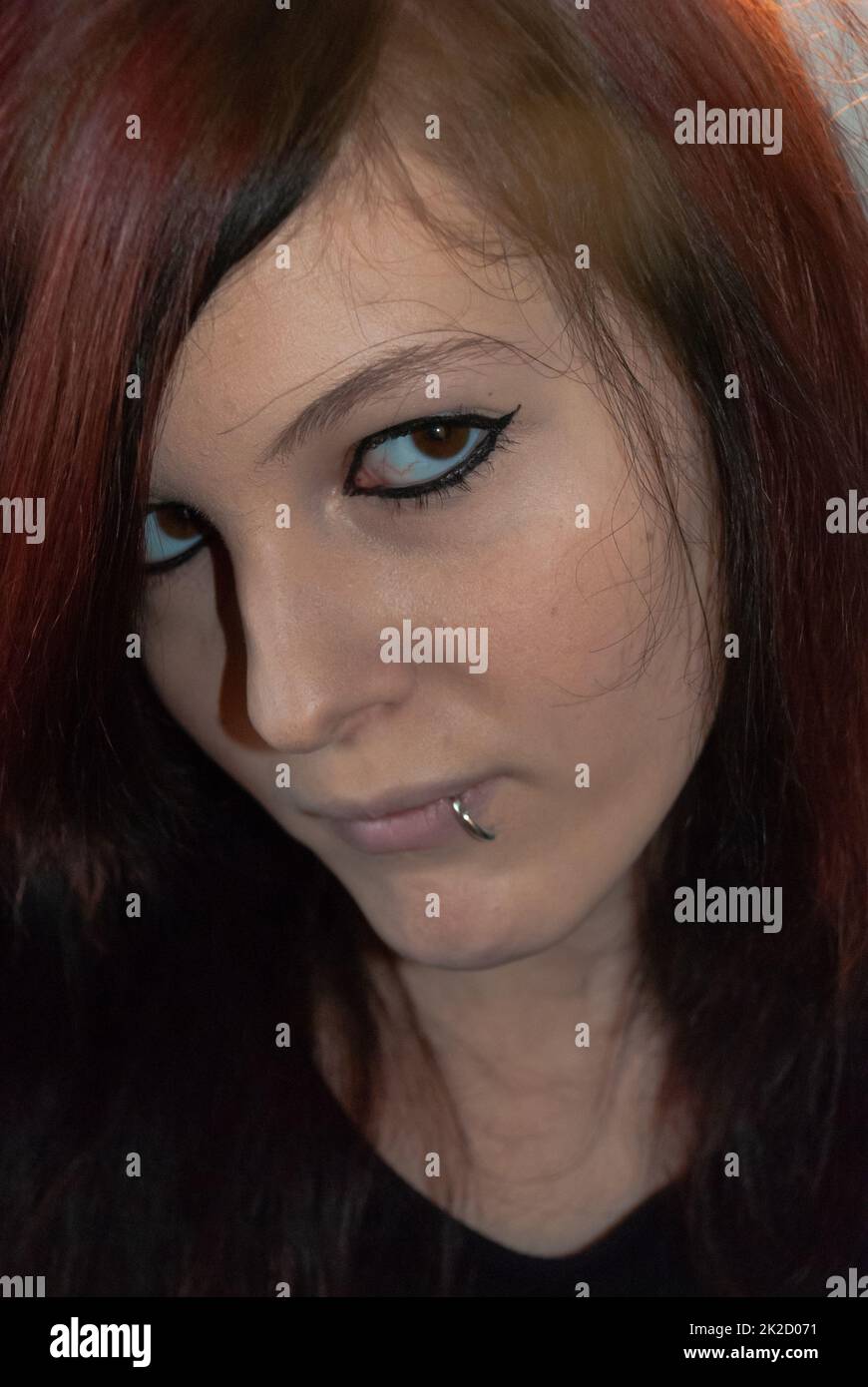 Young punk emo Girl looking at camera, close-up Stock Photo - Alamy