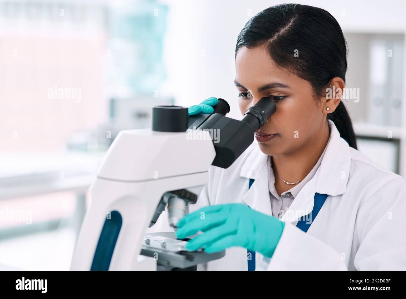 Indian doctor with microscope hi-res stock photography and images - Alamy