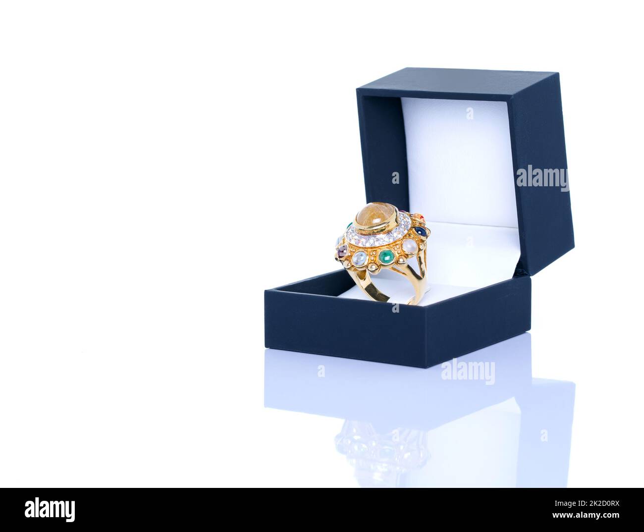 Golden Rutilated Quartz and diamonds with nine gemstones ring in dark ...