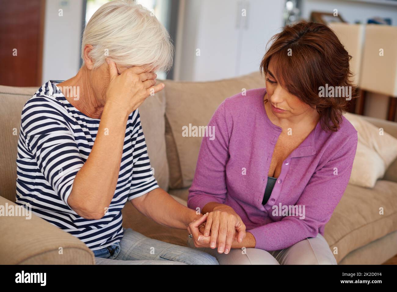 Woman and adult daughter and sad hi-res stock photography and images ...